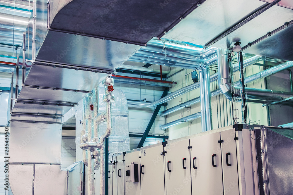 Industrial glycol pipeline insulated with metallic foil Stock Photo ...