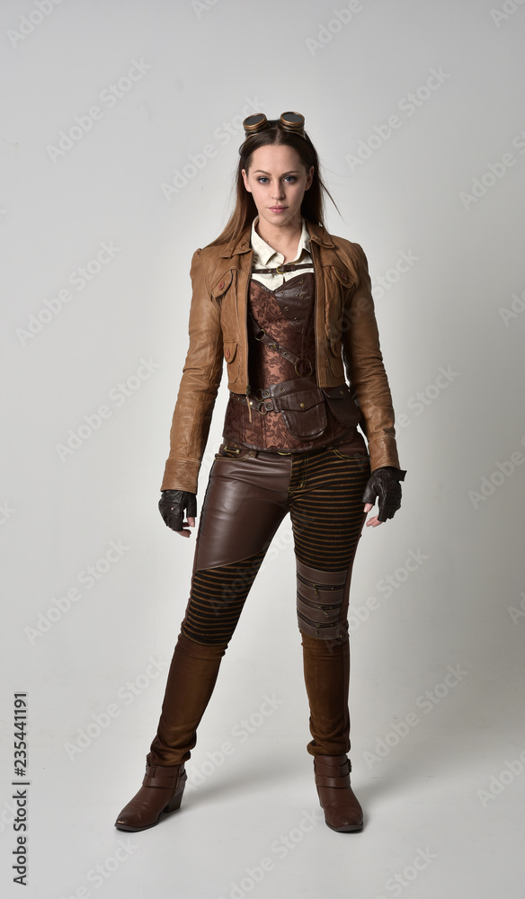 full length portrait of brunette girl wearing brown leather steampunk ...