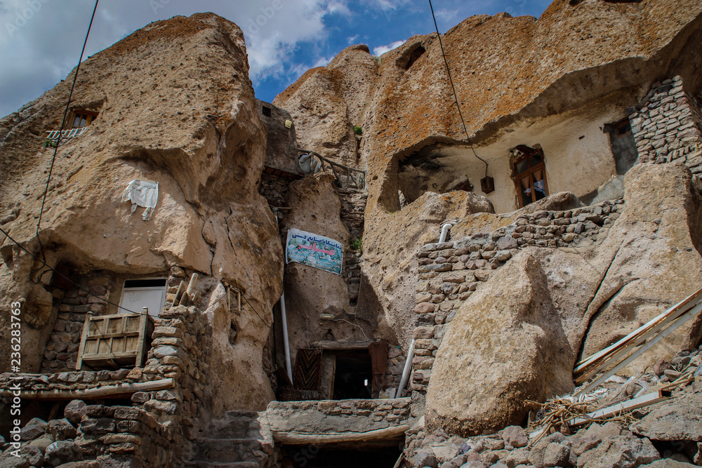 Ancient Iranian cave village in the rocks of Kandovan. The legacy of ...