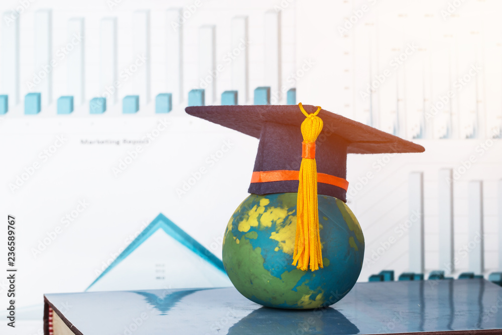 Education Graduate study business international concept: Graduation cap ...