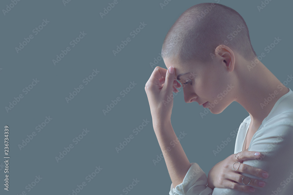 Sad, frightened and depressed female cancer patient portrait with copy ...
