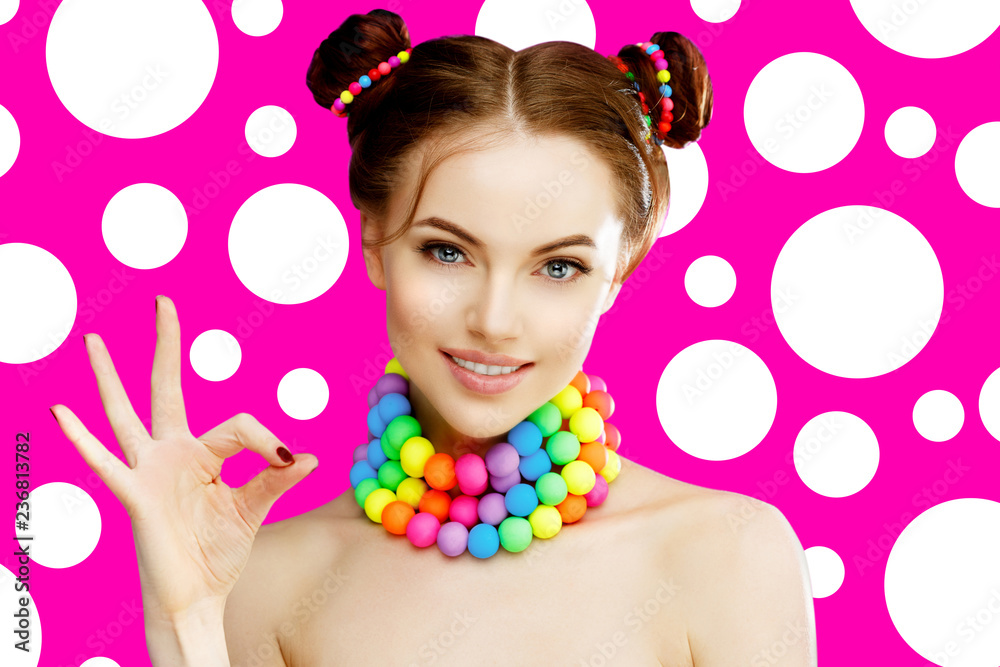 A bright girl model shows okay hand, fingers. Beautiful, stylish, young ...