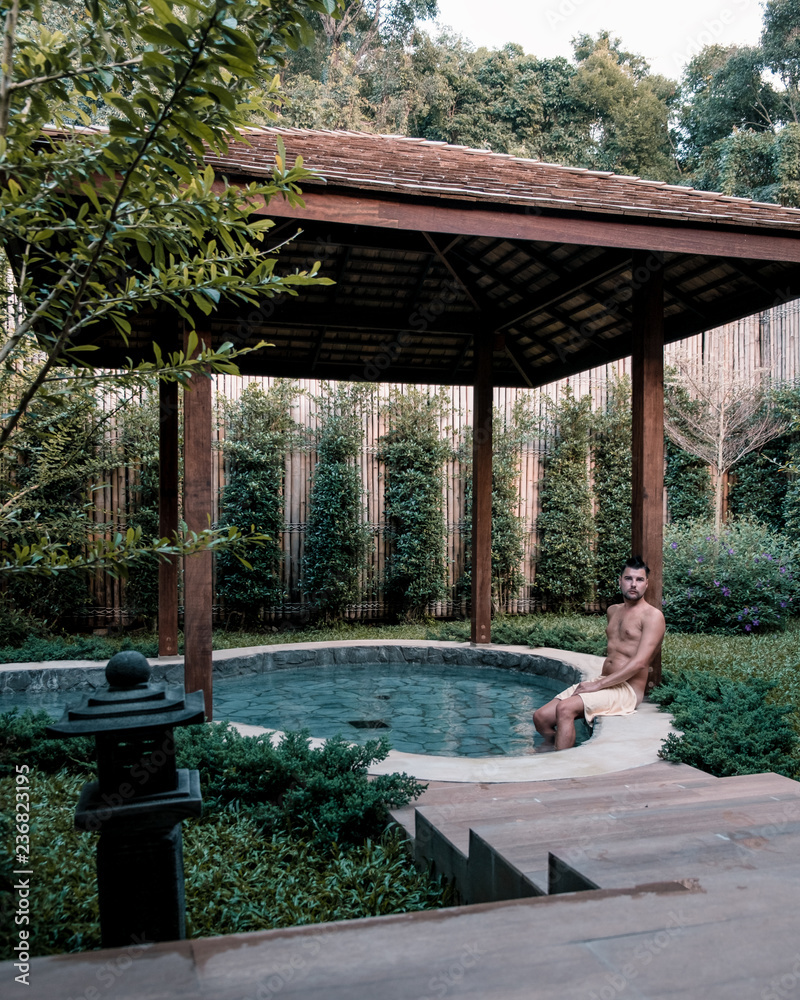young man at Onsen bath Spa, natural pool ,Onse wooden bath tub,Woman ...