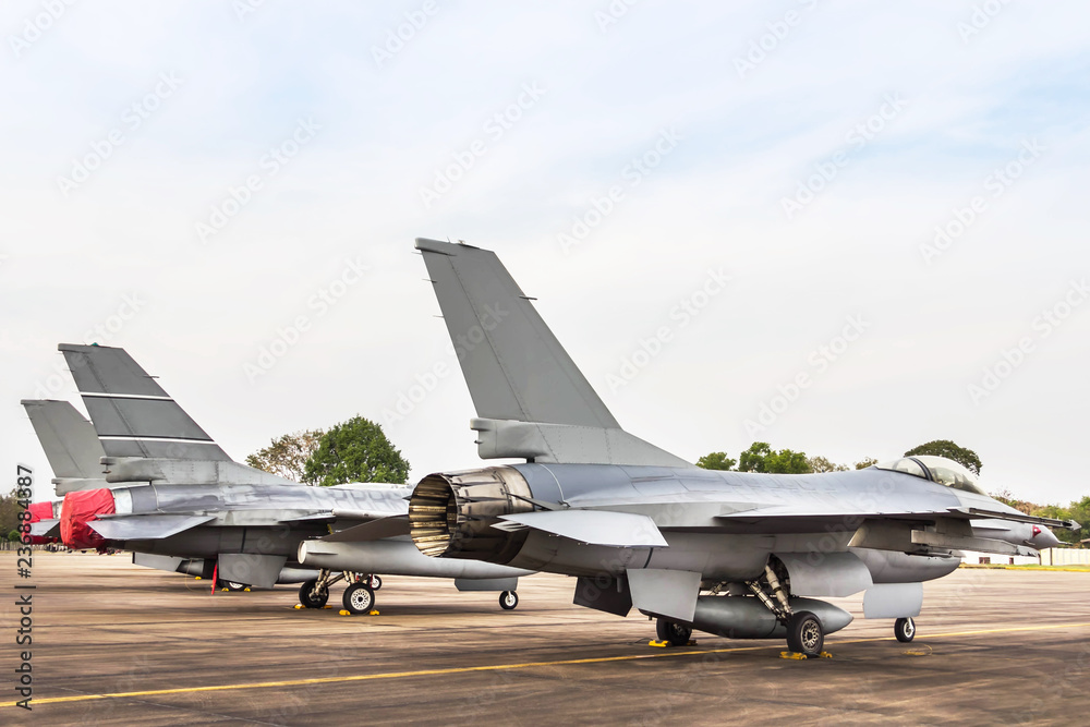 exhaust and tail fin side of fighting military fighter jet aircraft ...