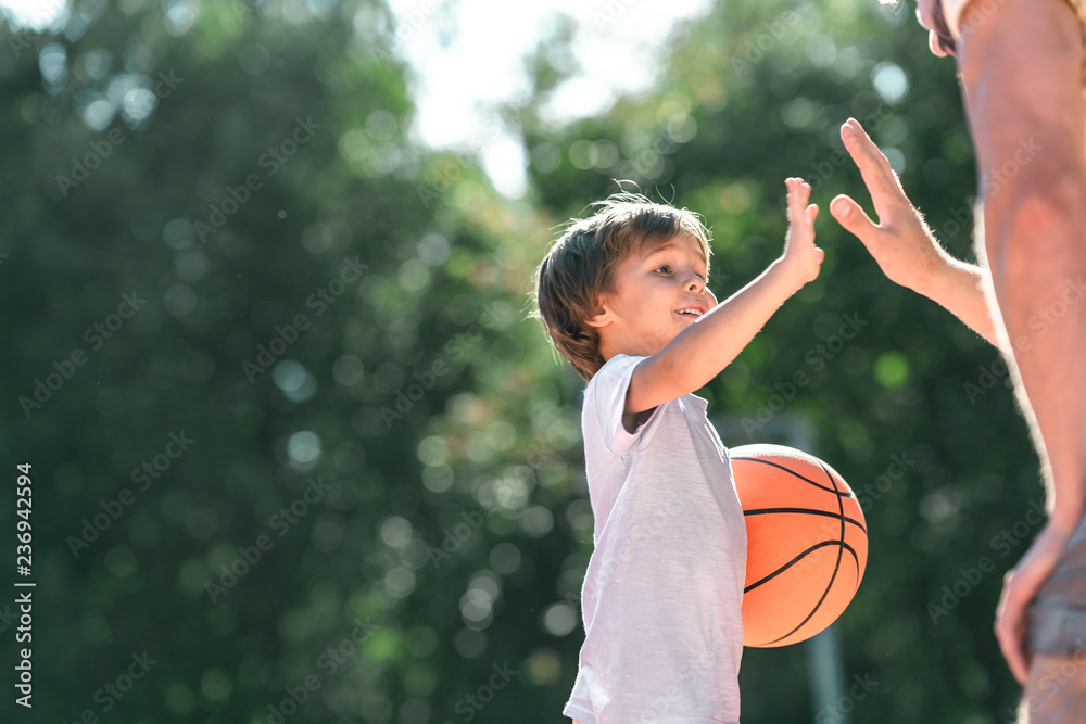 Happy boy with a ball Stock Photo | Adobe Stock