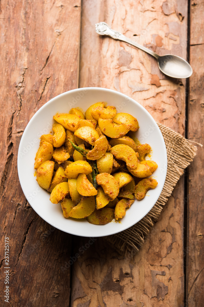Homemade Gooseberry or amla Pickle/ or Aavle ka Achar in a bowl or ...