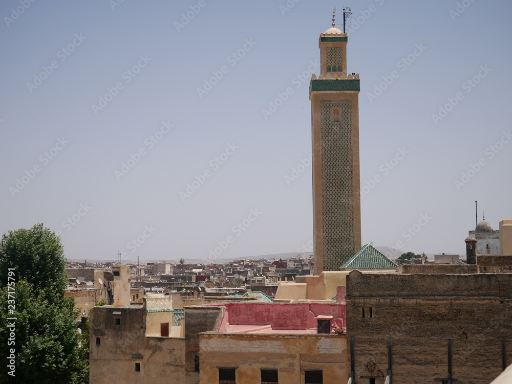 Panorama of the old town in Fez, Morocco, with the tower of a Mosque ...