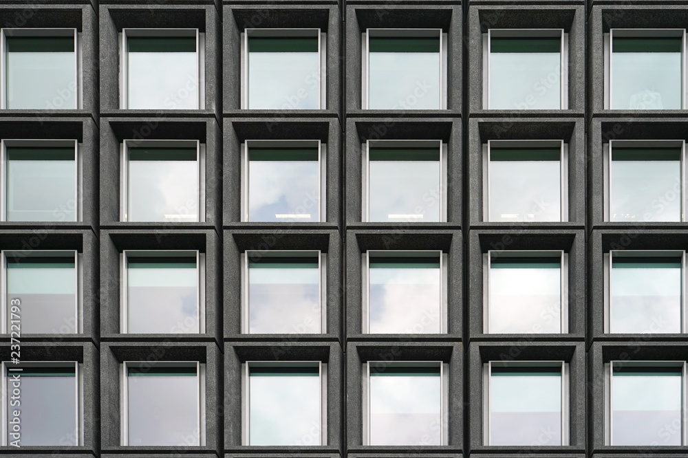 Glass grey square Windows of facade modern city business building ...