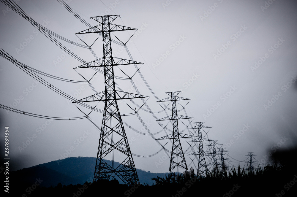 Foto de Stock Group silhouette of transmission towers (power tower ...
