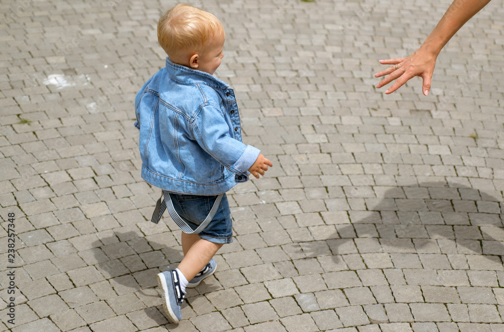 Lets just go walking. Baby boy. Little baby walk outdoor. Small baby on ...
