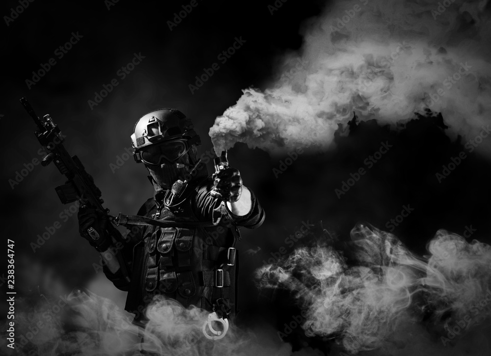 special forces soldier police, swat team member using smoke bomb Stock ...