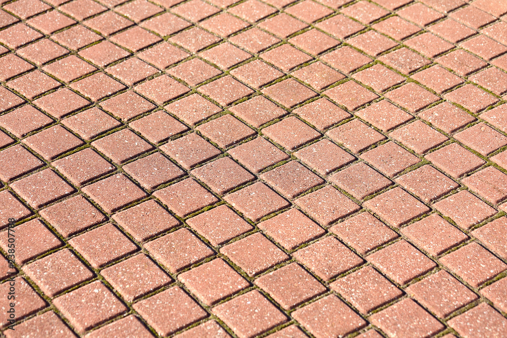 small rectangular red concrete paving slabs for paving. Background ...