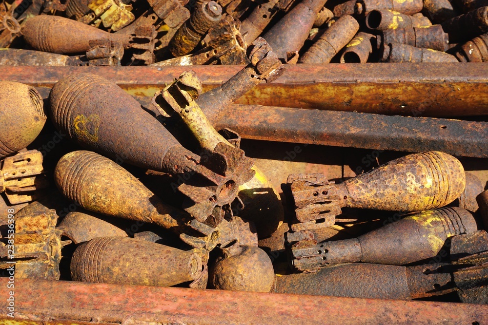 Pile of rusty unexploded ordnance recovered and disarmed in rural Laos ...