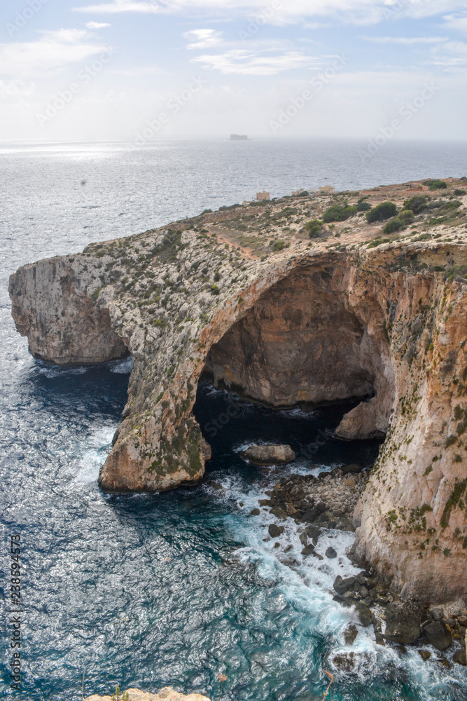 Famous natural limestone arch of the Blue Grotto is a number of sea ...