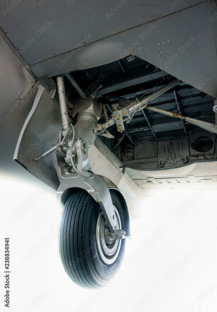 Wheel of flying airplane Stock Photo | Adobe Stock