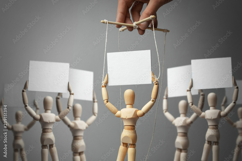 Foto de Stock Provocateur puppet activist is calling people to protest ...
