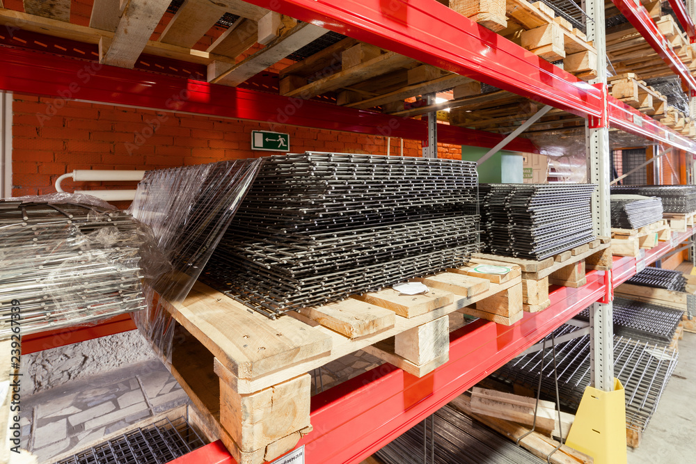 Factory warehouse steel reinforcement. High stacked shelving. Stock ...