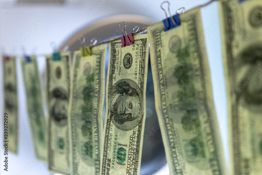 background. defocusing. one hundred dollar bills after washing ...