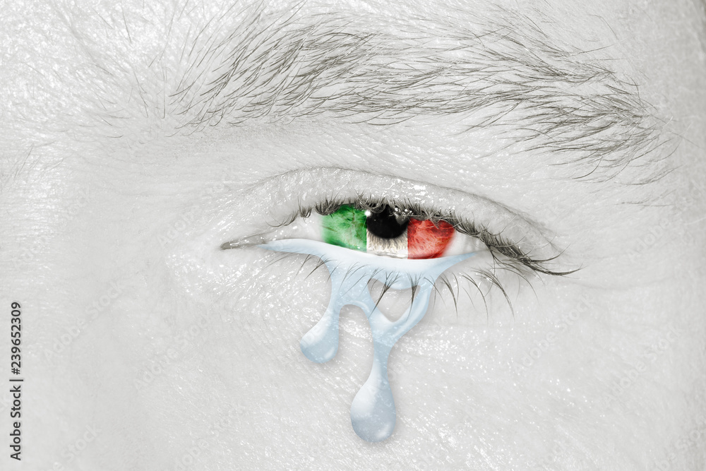 Crying eye with the flag of Italy in iris on black and white face ...