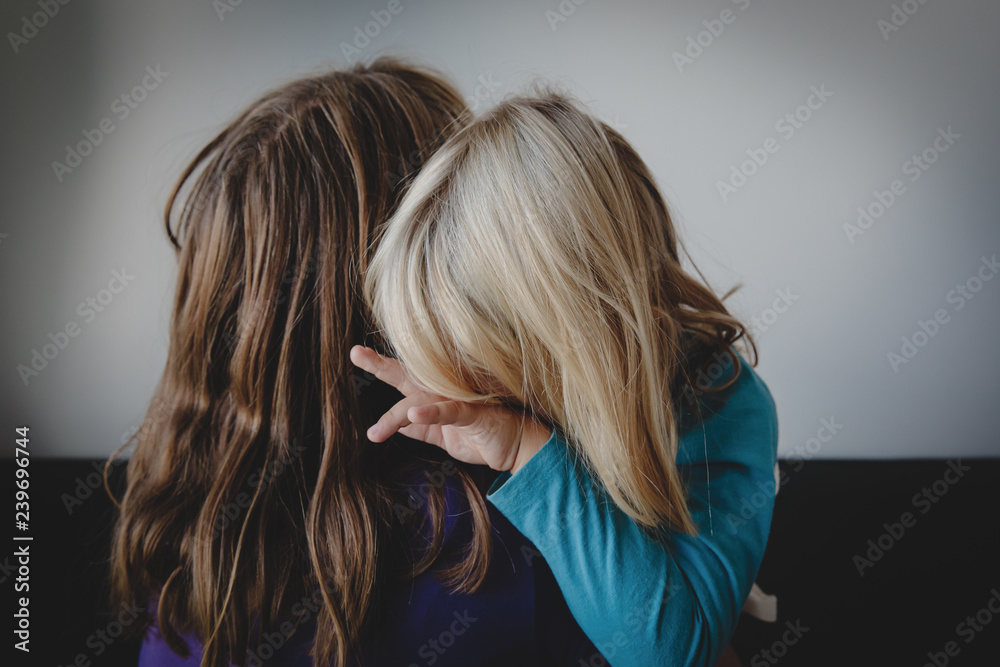 sad crying little girl hugging mother, parenting Stock Photo | Adobe Stock