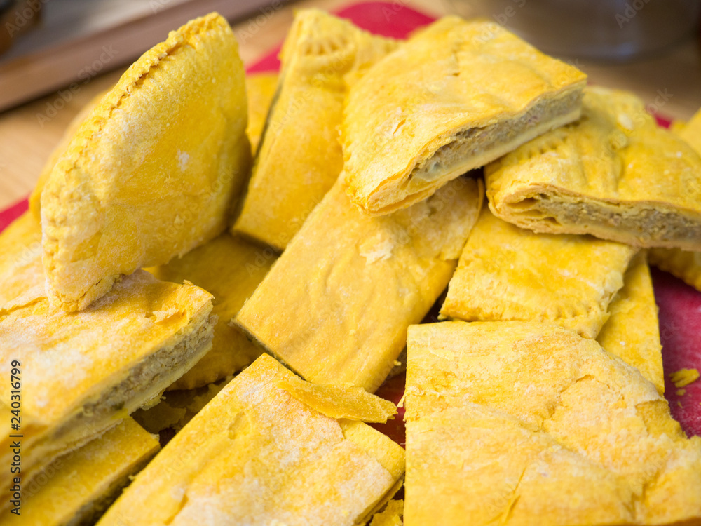 Photo Stock Closeup photograph of Jamaican beef patties with flaky ...