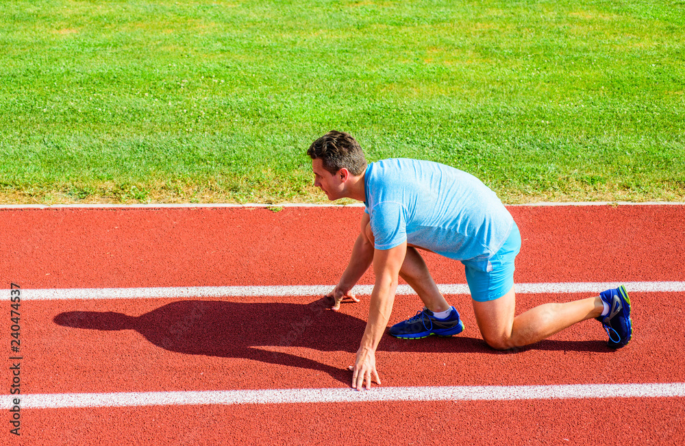 Adult runner prepare race at stadium. How to start running. Sport ...