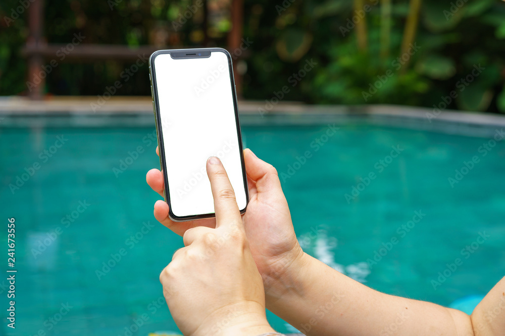 woman in the pool holding phone with an isolated screen and modern ...