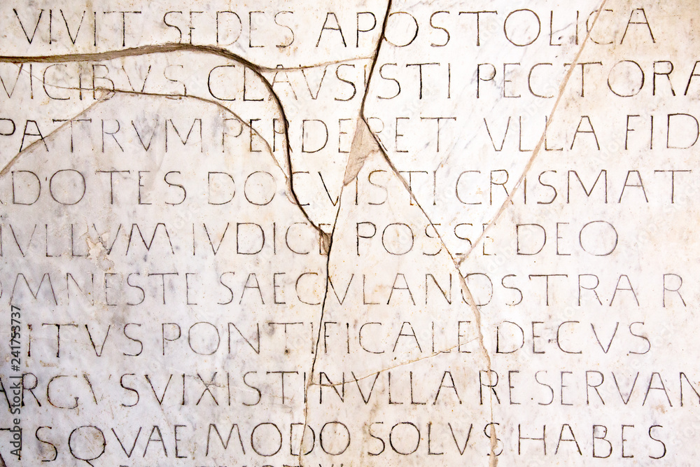Latin inscriptions background wallpaper on an ancient cracked marble ...