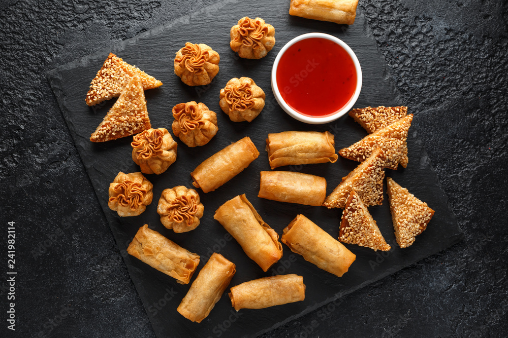 Crispy Chicken wontons, vegetable spring rolls and prawn toasts with ...