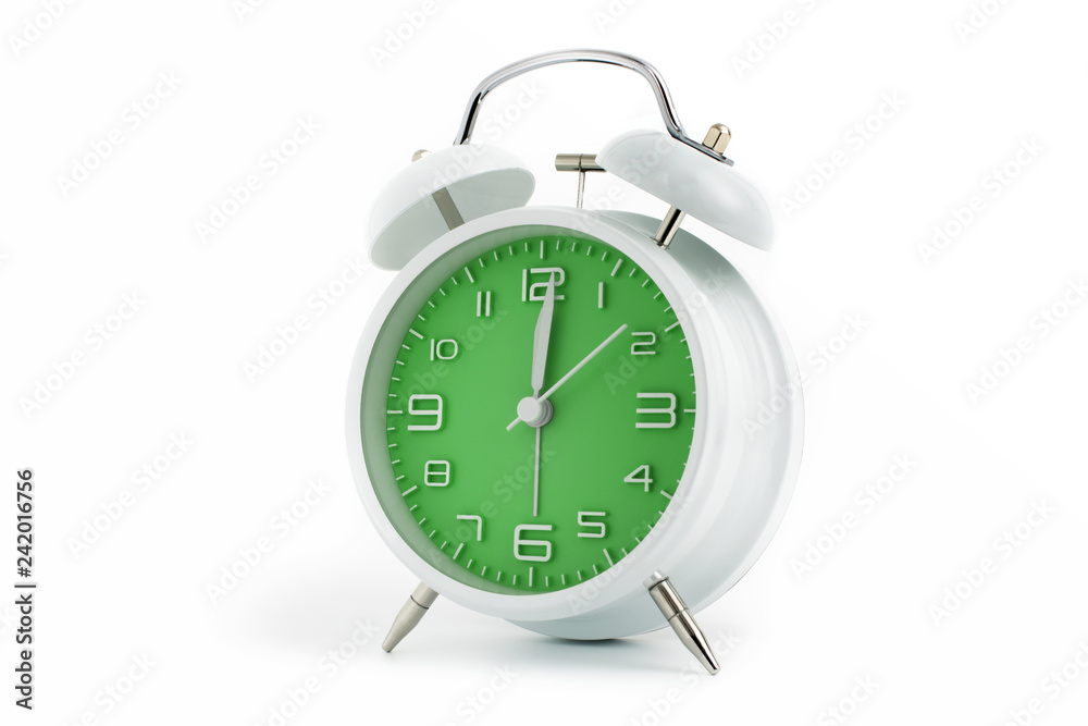 Twin bells analogue alarm clock with green clock face shows 1 past 12 ...