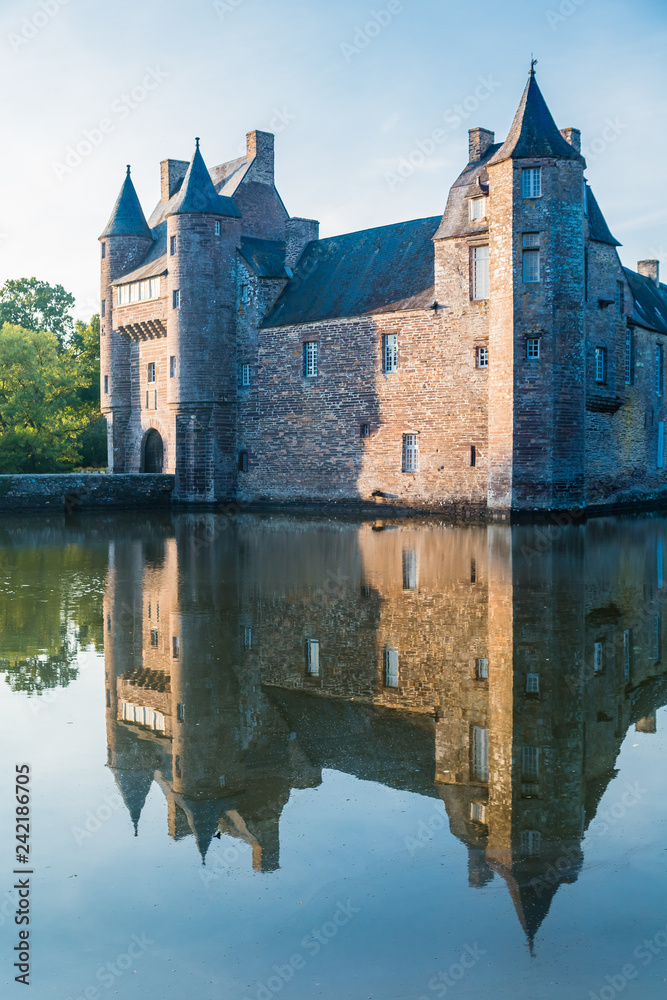 The turrets and drawbridge of the 14th century Chateau de Trecesson in ...