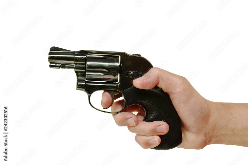 hand holding revolver gun and finger on trigger prepare to shoot in ...