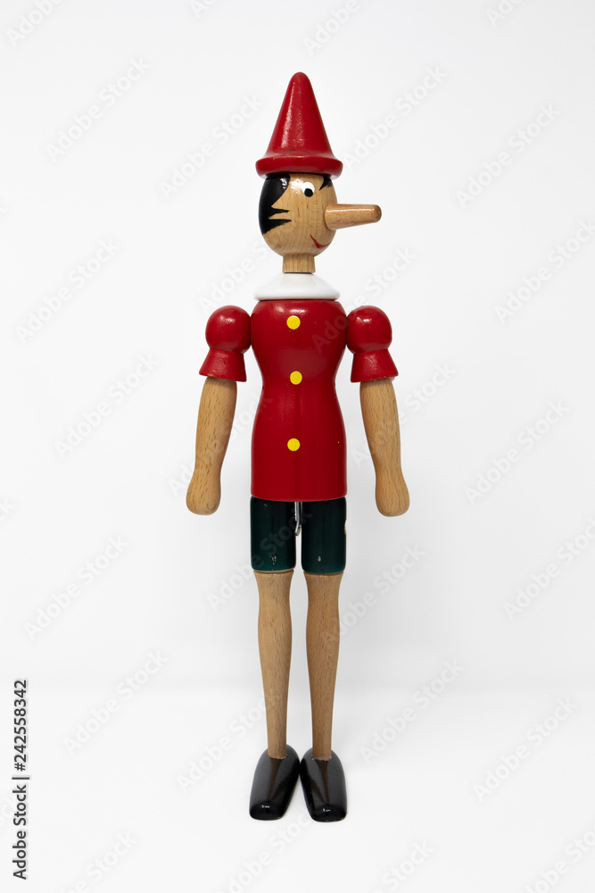 Pinocchio, the wooden puppet, isolated on white background. From the ...