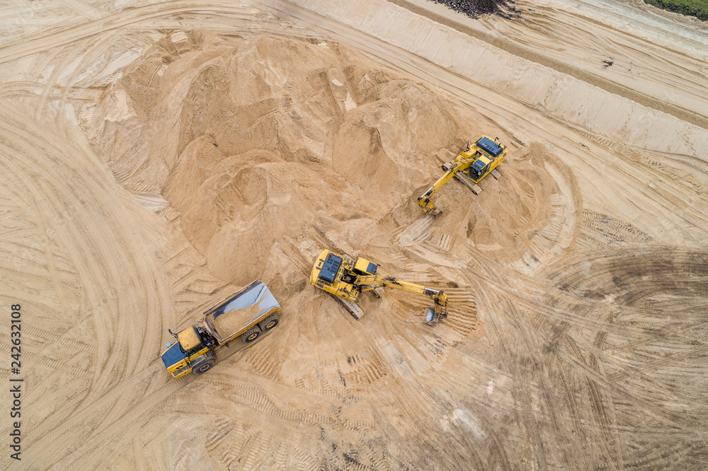 loading sand excavator in a dump truck on the construction site Stock ...