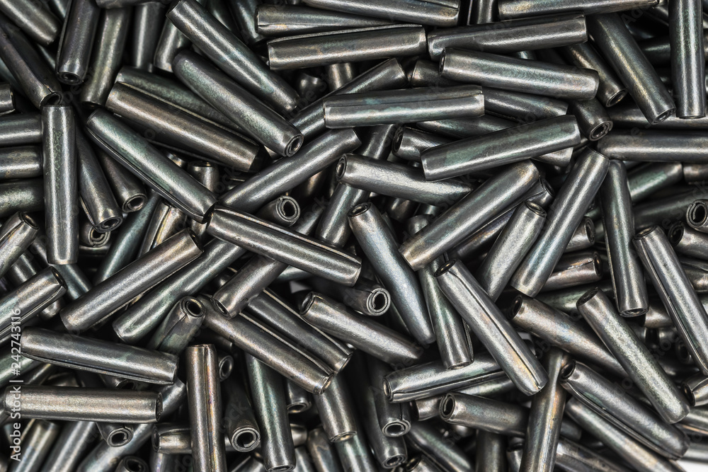 coiled spring pin according to ISO 8748 standard Stock Photo | Adobe Stock