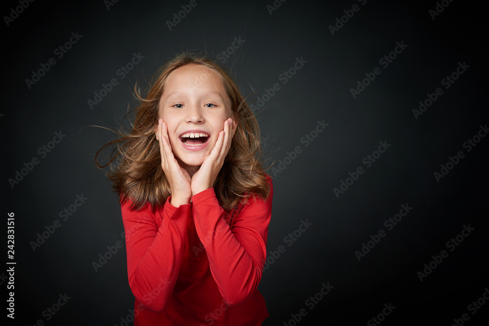 Excited surprised preteen girl screaming of joy Stock Photo | Adobe Stock