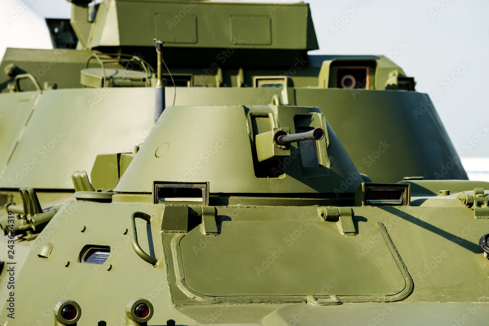 Large caliber machine gun with a rotary turret on the tank closeup ...