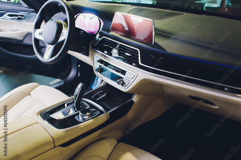 Car luxury inside. Interior of prestige modern car. Front seats with ...