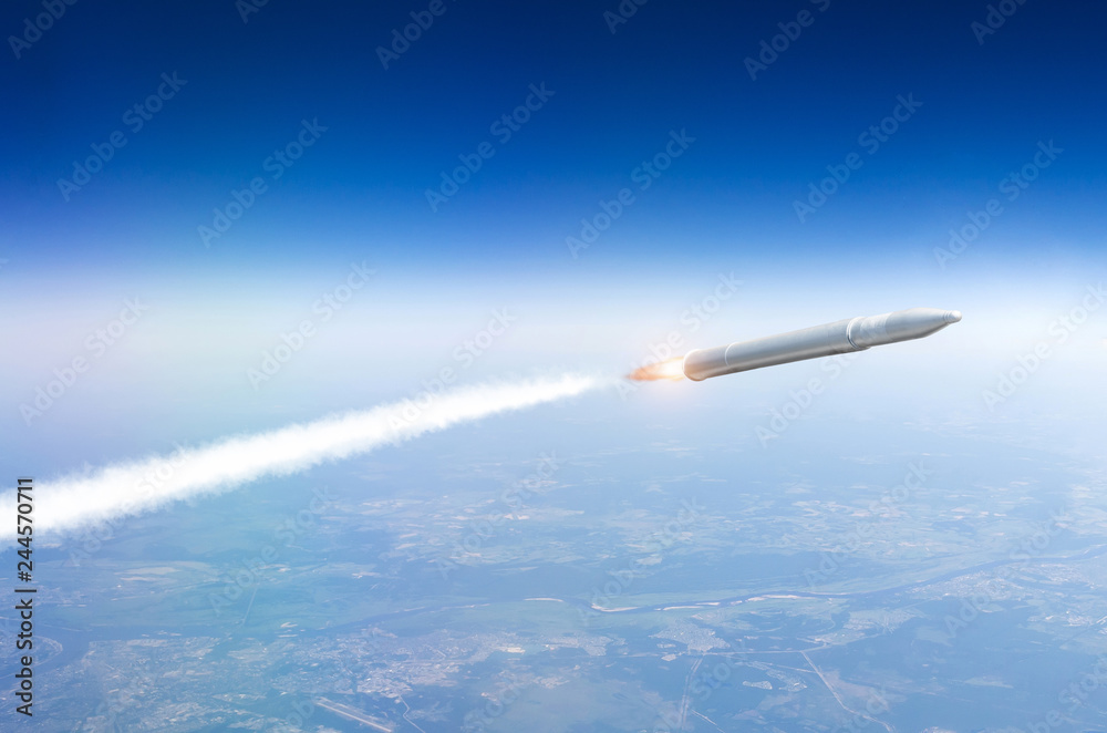 Missile launched from the ground, flying in the air. Stock Photo ...