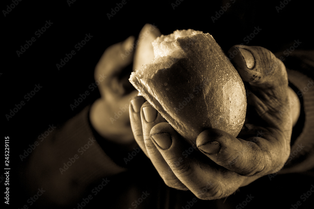 Helping hand giving a piece of bread. Poor Man sharing Bread, Helping ...