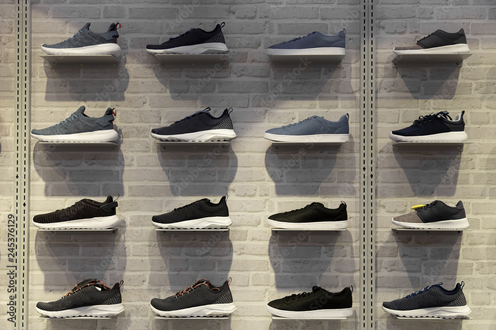 Shop display of unbranded modern new stylish sneakers running shoes for ...