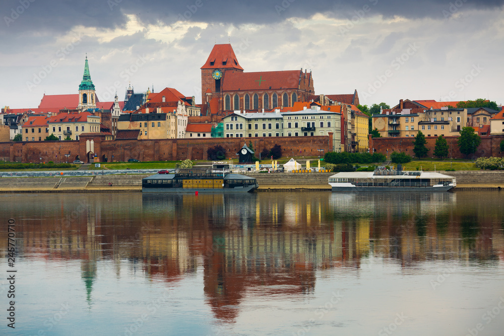 Torun across Vistula with Catholic church Stock Photo | Adobe Stock