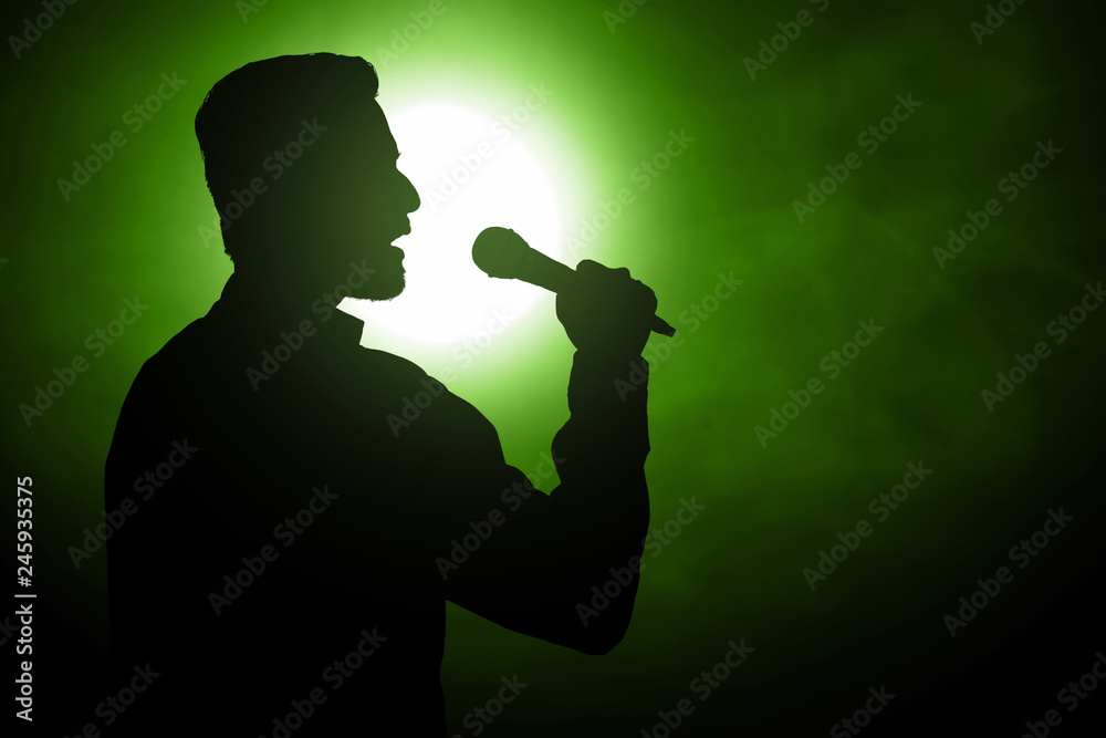 Singer singing silhouette Stock Photo | Adobe Stock