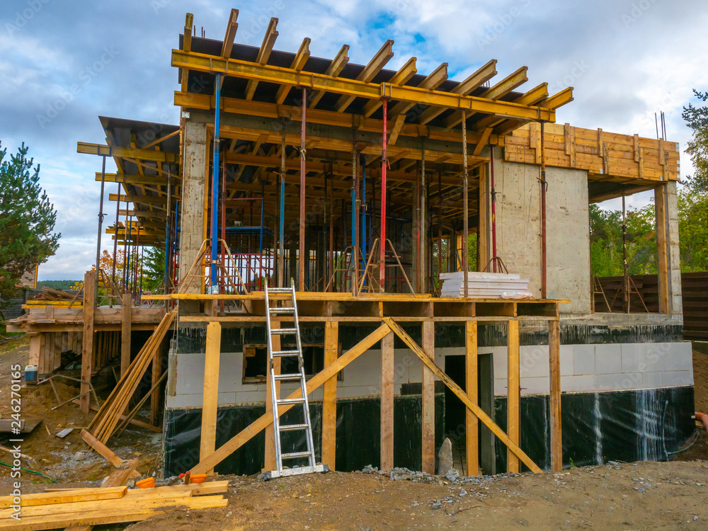 Home construction. Cottage frame. Construction works. Concrete frame ...
