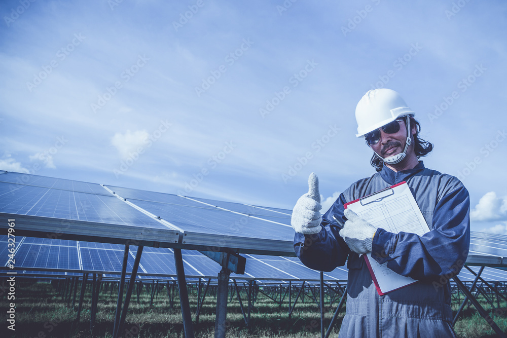 engineers operating and check generating power of solar power plant on ...