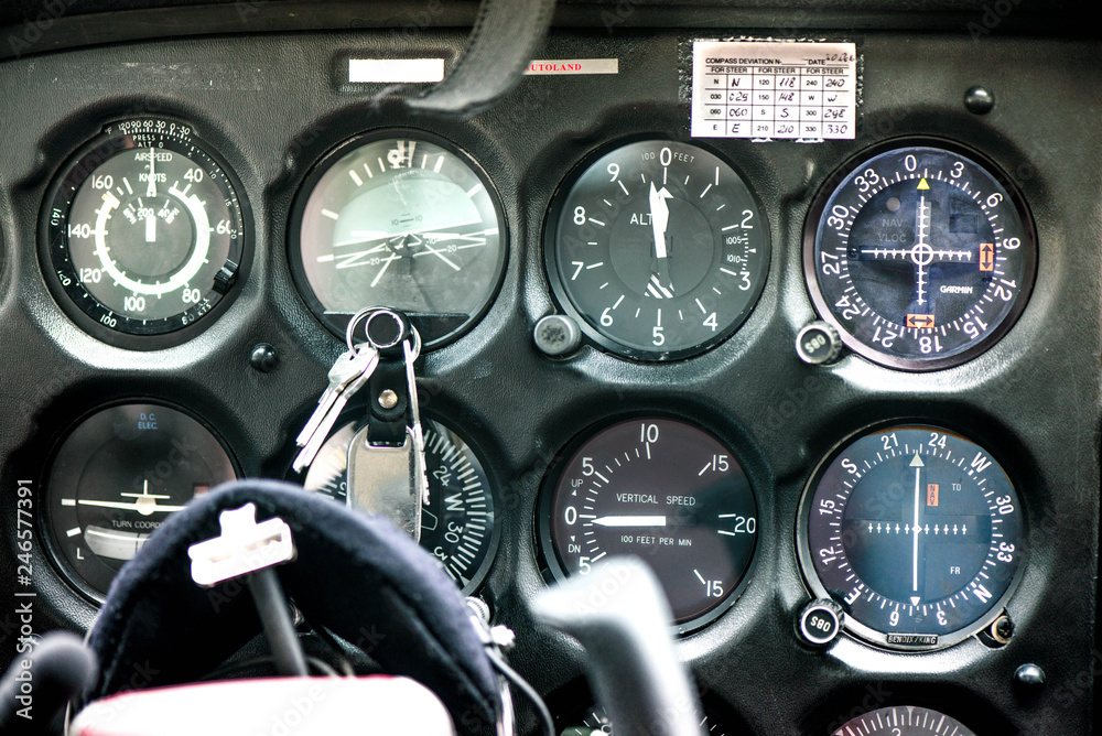 Detail of old airplane cockpit. Aircraft equipment, various indicators ...
