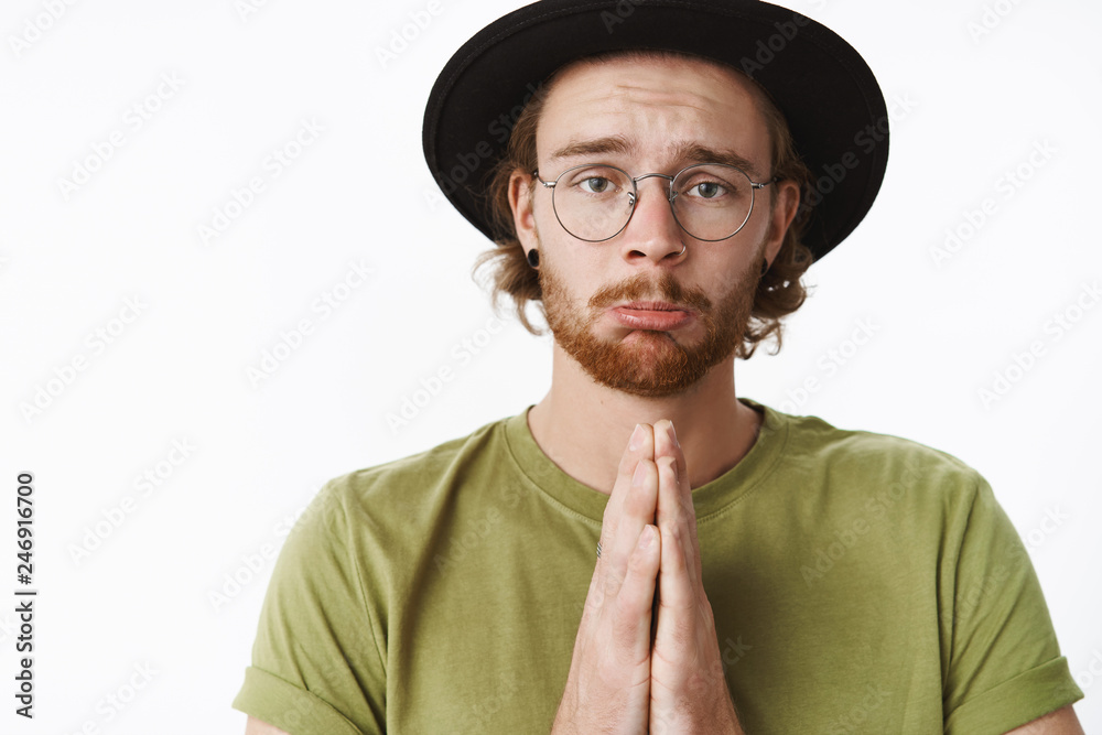 Guy making silly face as asking forgiveness pouting and frowning cute ...