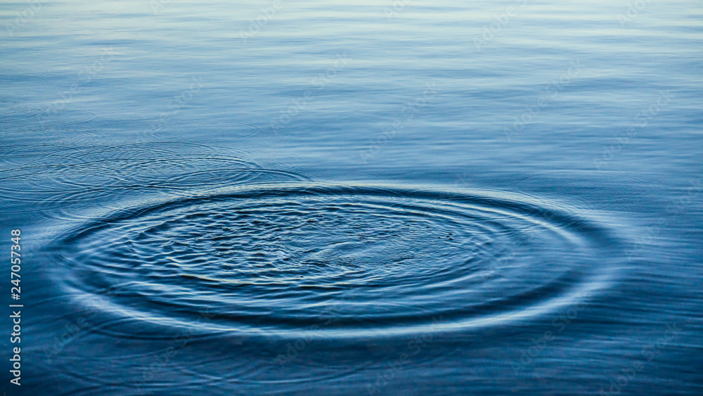 Ripples on sea texture pattern background. Round droplets of water over ...