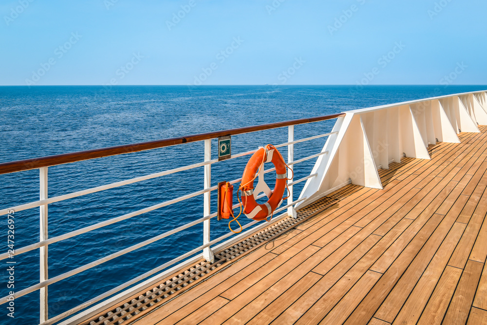 Cruise ship deck with safety railing. Stock Photo | Adobe Stock