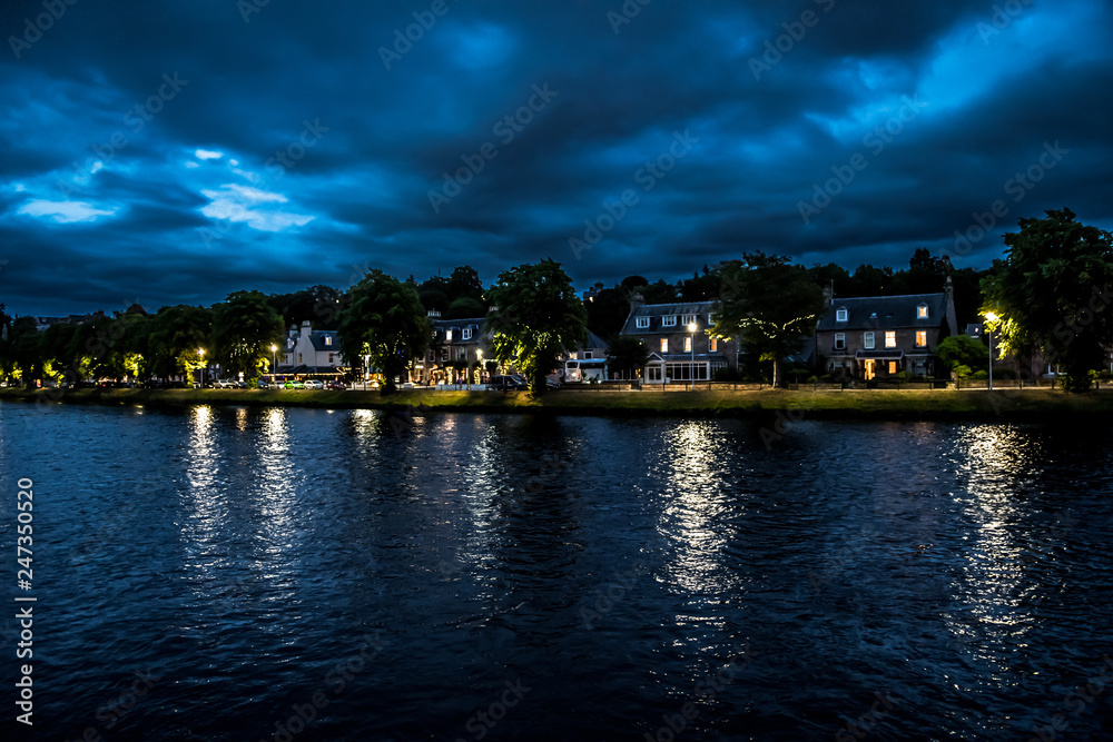Illuminated Buildings In The Scenic Streets Of The City Of Inverness At ...
